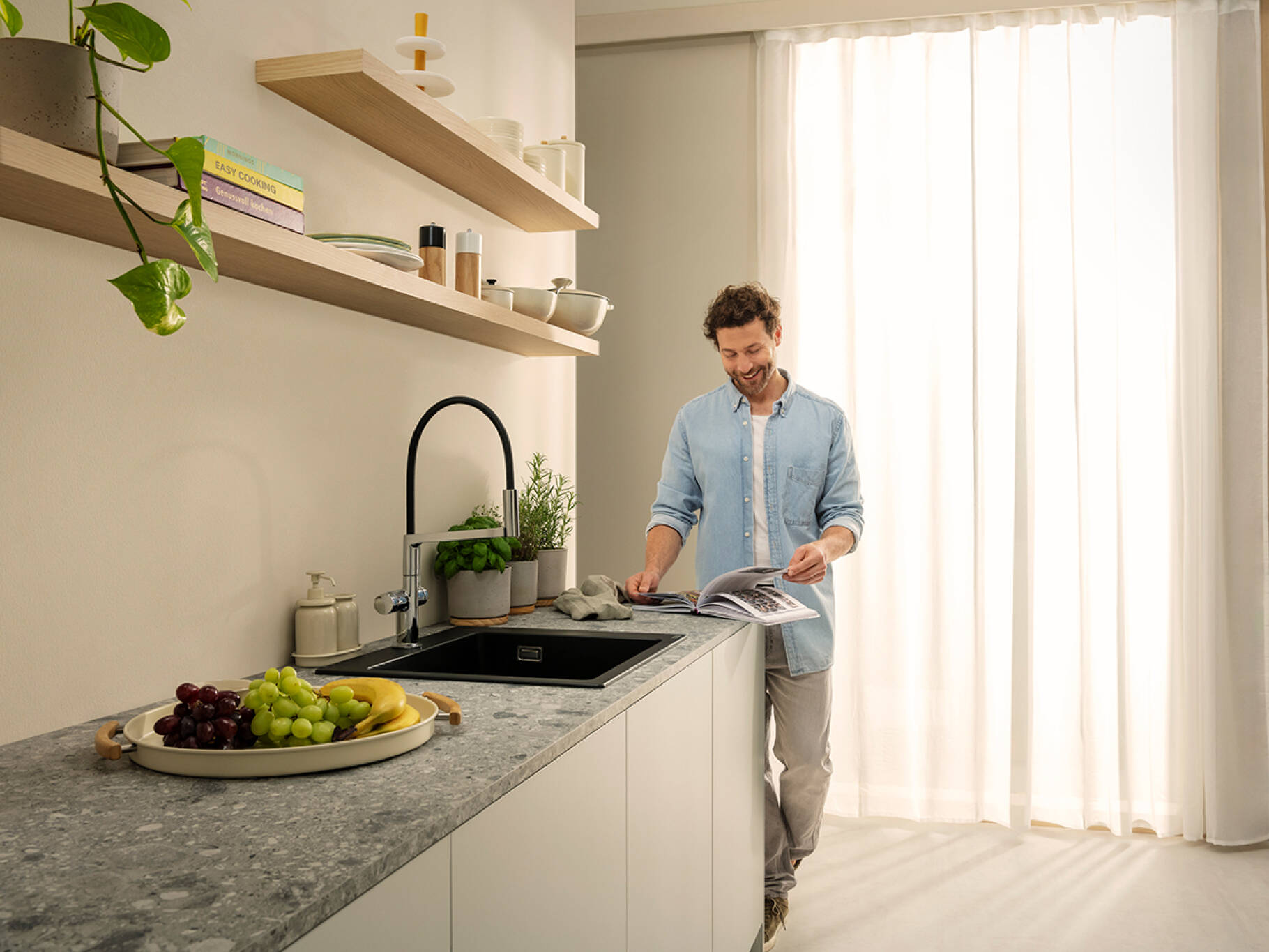 Kitchen faucet with three spray modes.