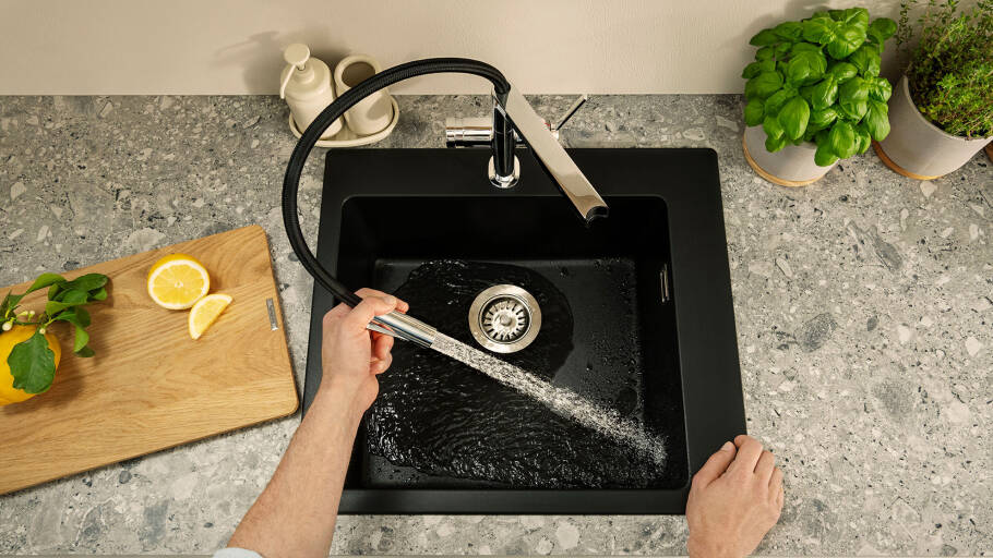 Kitchen faucet with three spray modes.